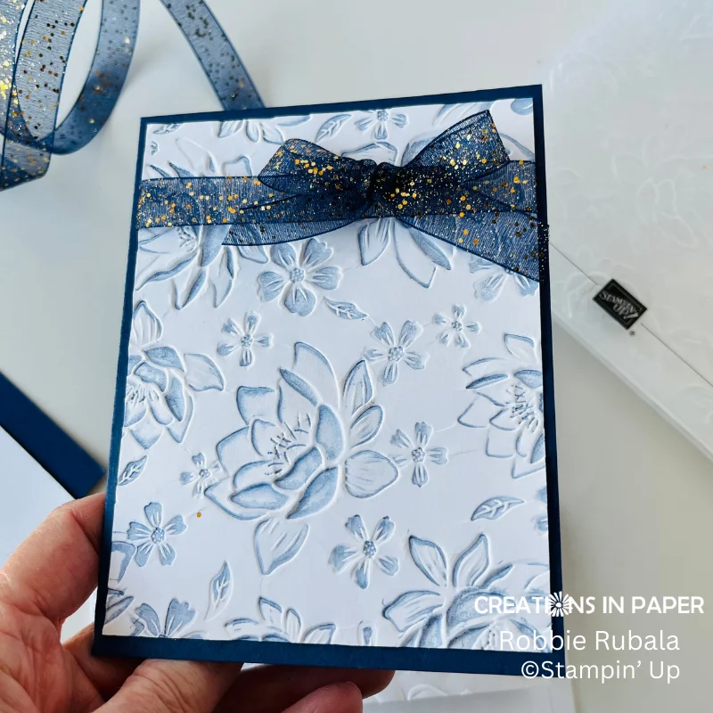 Inking the Layered Florals embossing folder - Creations in Paper